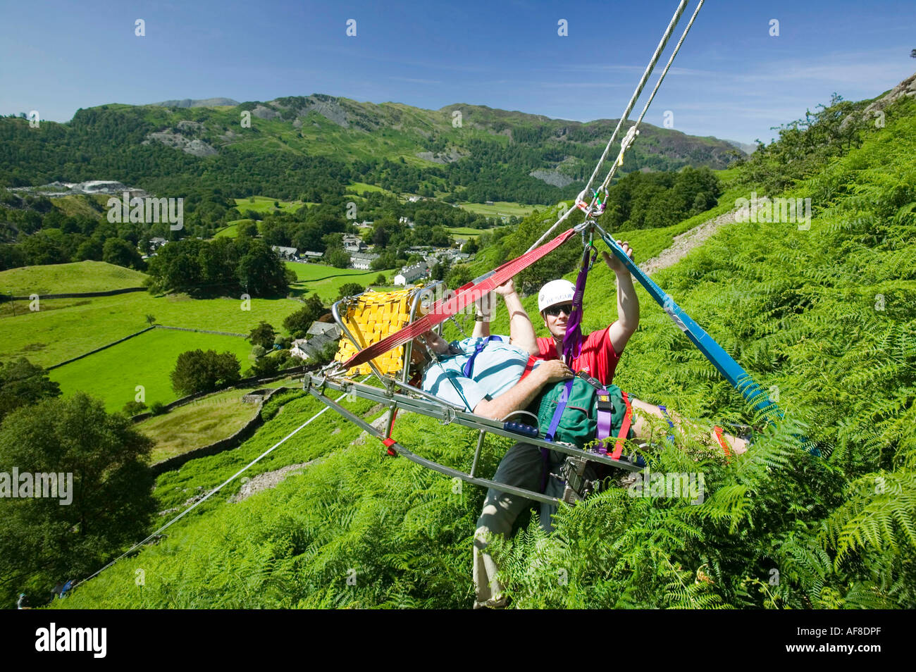 members of Langdale Ambleside Mountain rescue team doing a vertical ...