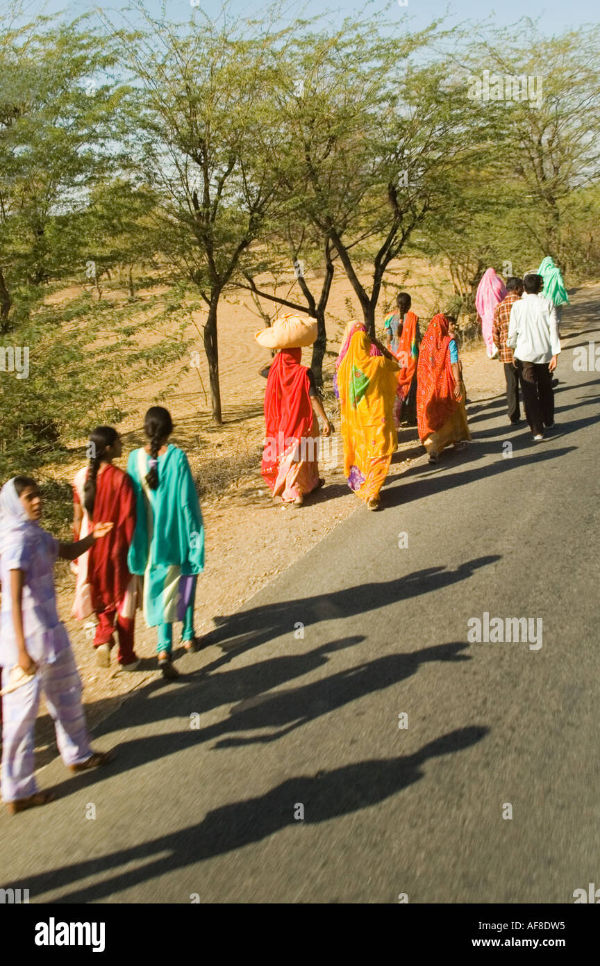 Vertical elevated view of a group of Indian men and women walking along ...