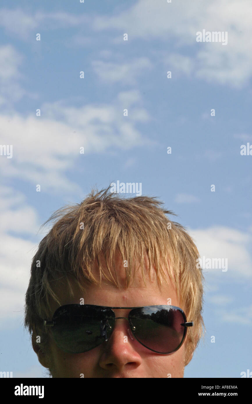 A Stock Photograph of a Student in the Summer Sun with Sunglasses on ...