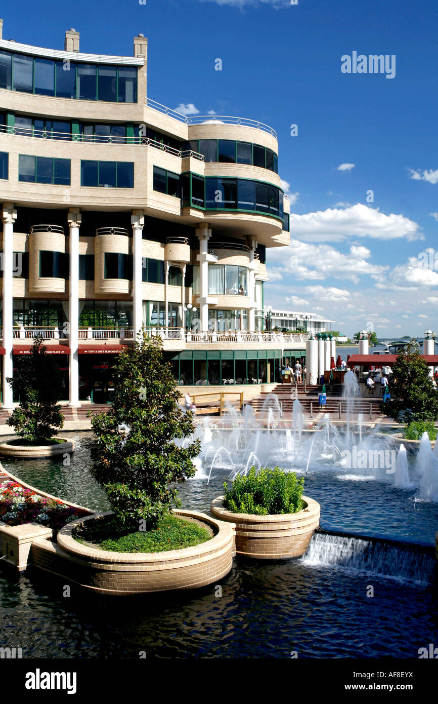 Office buildings and fountain under blue sky, Georgetown, Washington DC ...