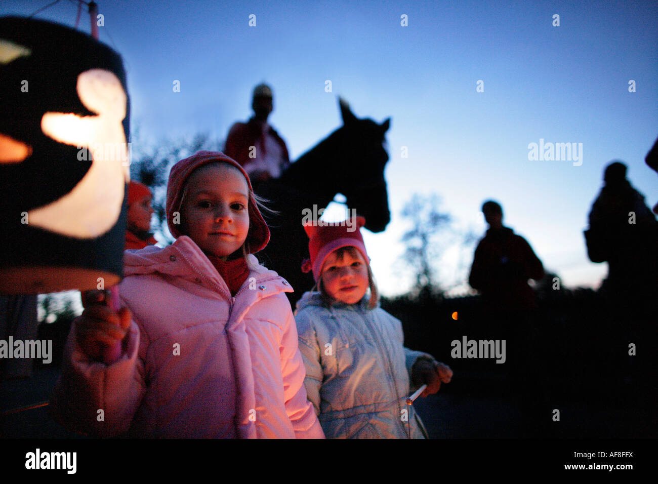 Children carrying lanterns for the St. Martin festival with St. Martin ...