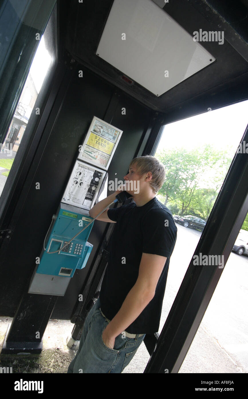Man inside telephone box hi-res stock photography and images - Alamy