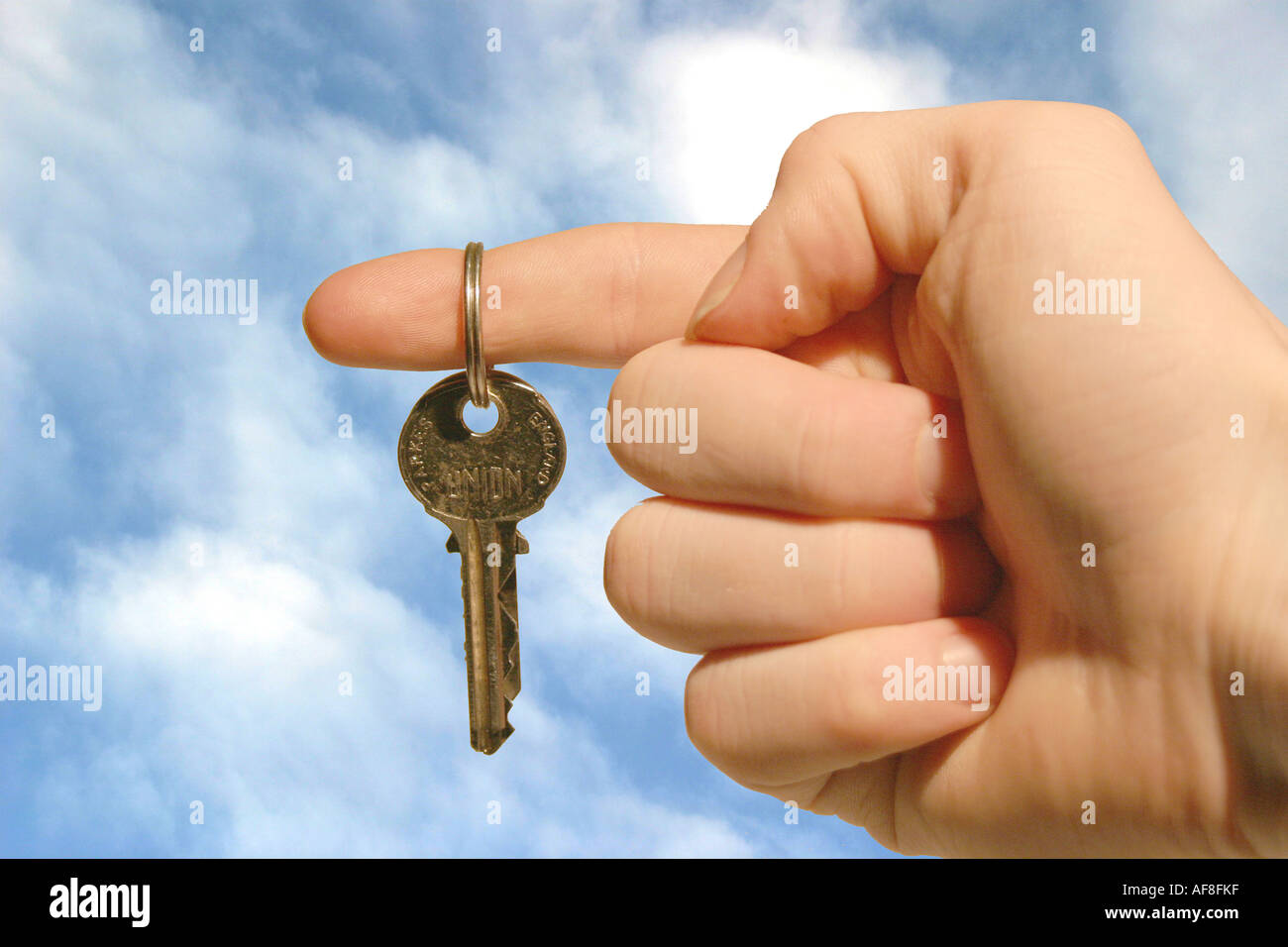 A Stock Photograph of a Man Holding Keys in His Hand Stock Photo - Alamy