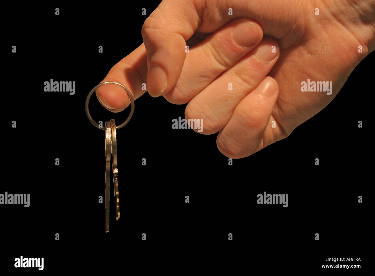 A Stock Photograph of a Hand Holding some Keys Stock Photo - Alamy