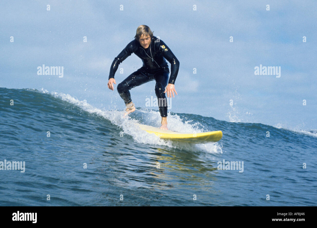 Taking off wetsuit hi-res stock photography and images - Alamy