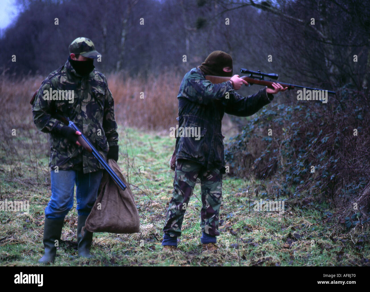 Camouflage guns hi-res stock photography and images - Alamy