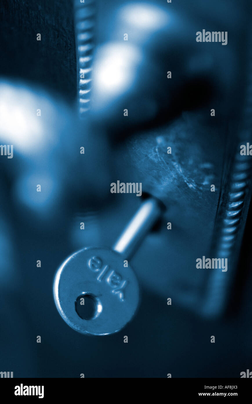 key in keyhole Stock Photo - Alamy