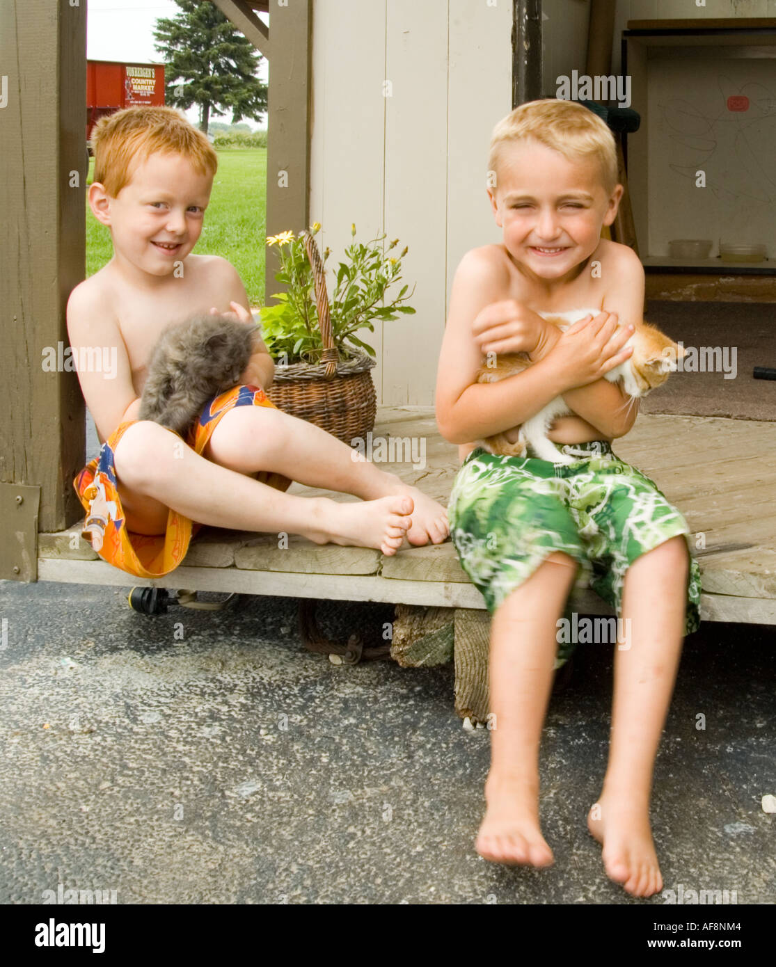 Farm play two boys hi-res stock photography and images - Alamy