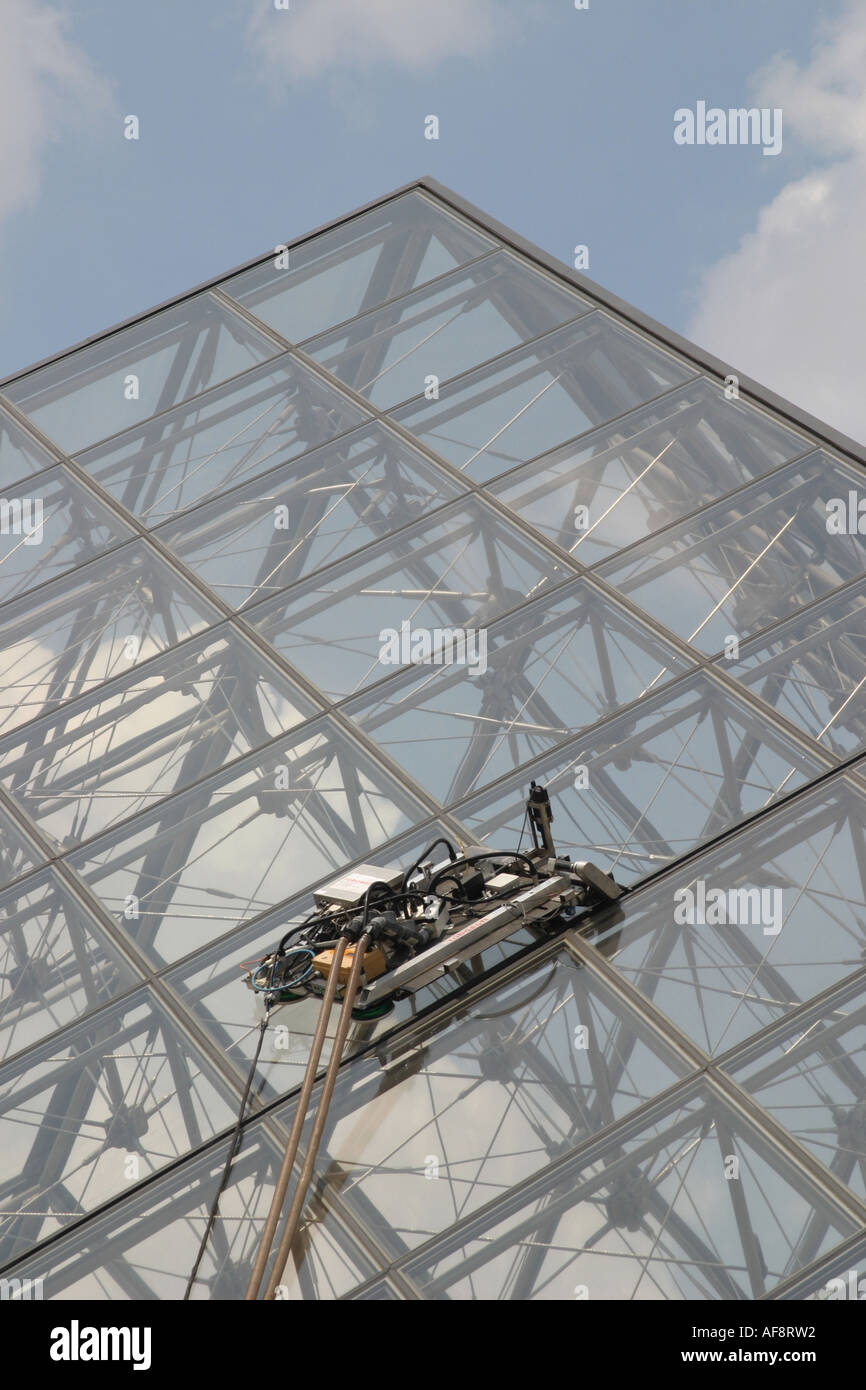 Louvre museum robot cleaning glass pyramid hi-res stock photography and ...