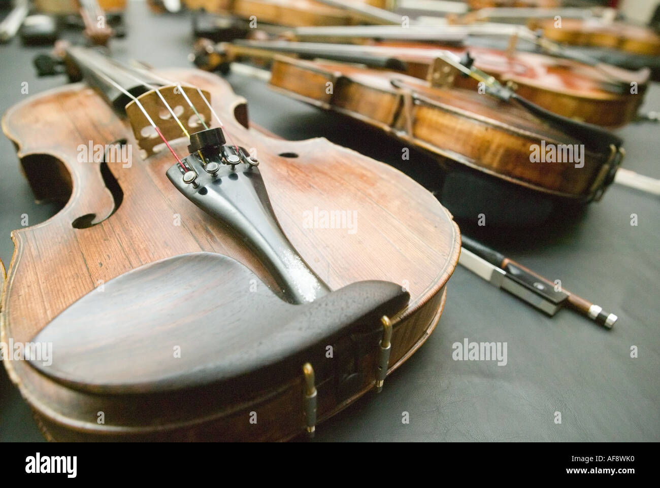 Violins on the table Stock Photo - Alamy