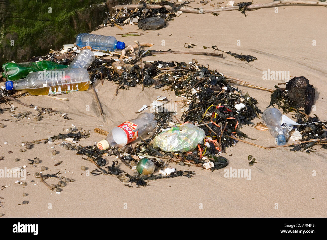 Rubbish on beach Stock Photo - Alamy