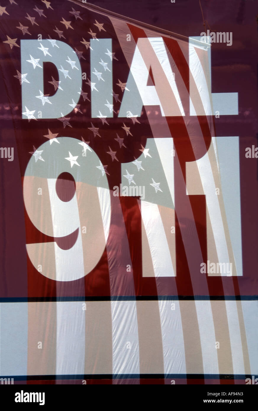 Dial 911 emblem displayed on a fire truck with the American Flag ...