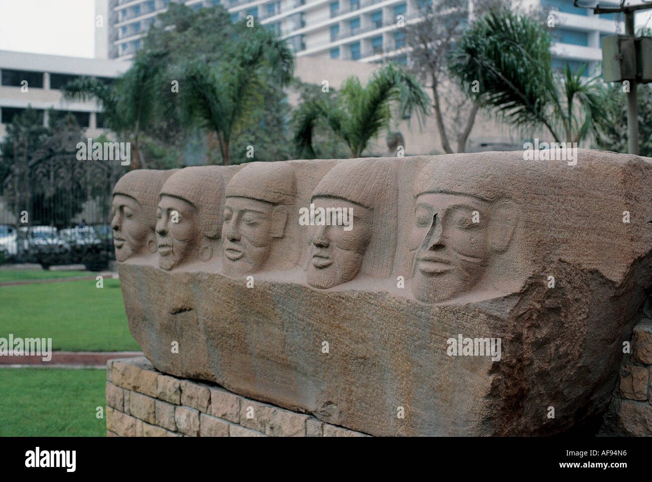 A stone carving depicting the heads of five slaves of Ramesses II in ...
