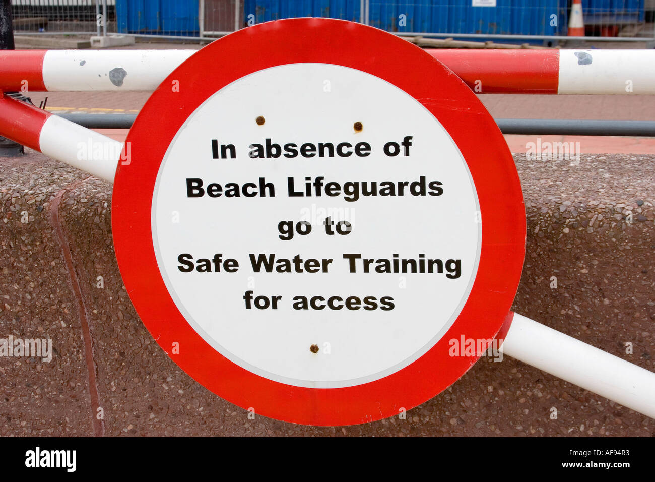 Warning sign sea-side Stock Photo - Alamy
