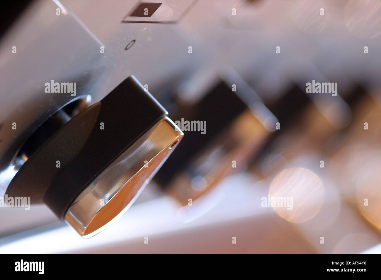 A Stock Photograph of a Row of Buttons on a Modern Cooker Stock Photo ...
