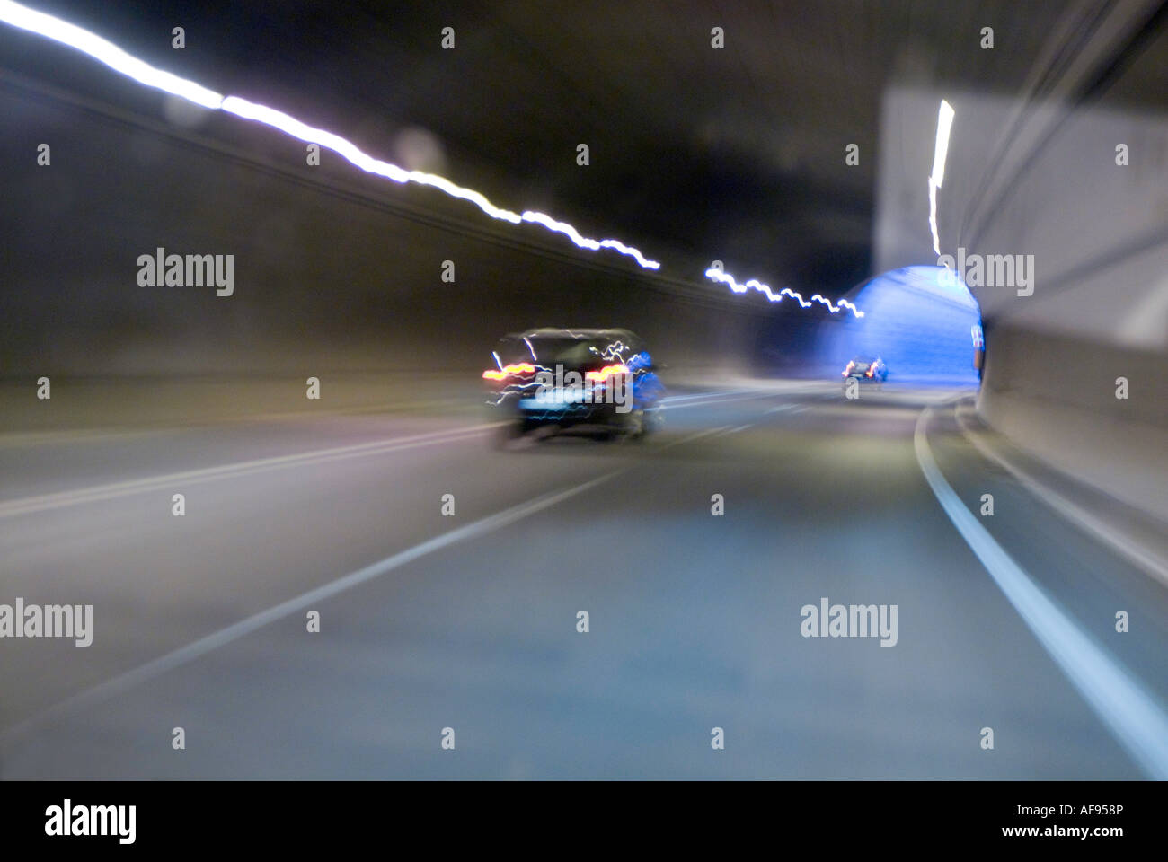 Cars driving through tunnel hi-res stock photography and images - Alamy