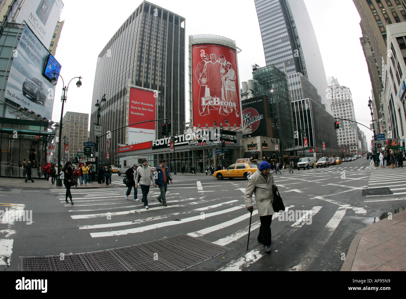 elderly infirm old woman pedestrian with stick crossing crosswalk on ...
