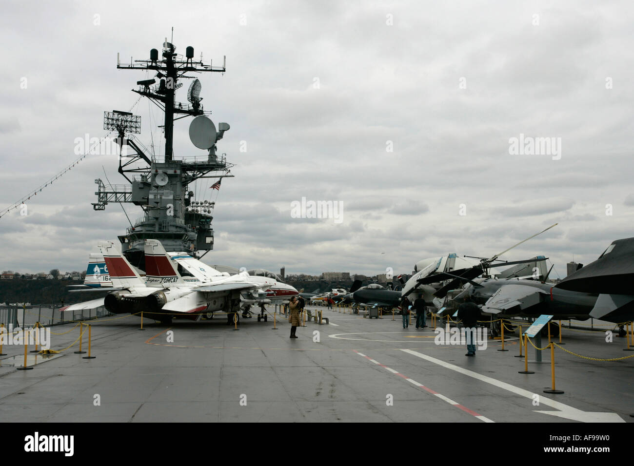 tourists and Aircraft on the flight deck of the USS Intrepid at the ...