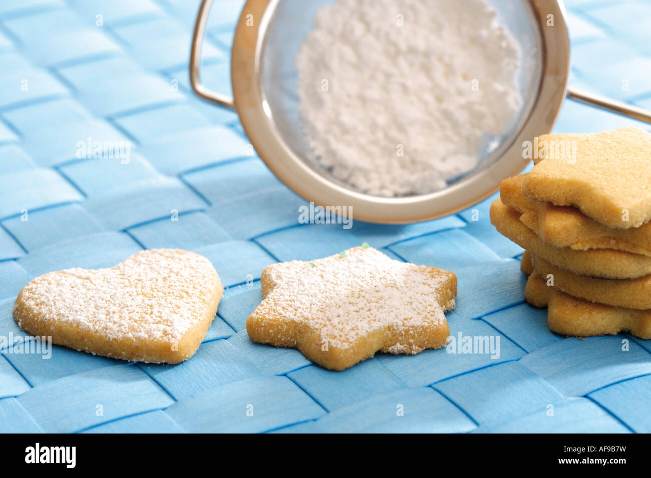 Shortcrust biscuits with icing sugar Stock Photo - Alamy