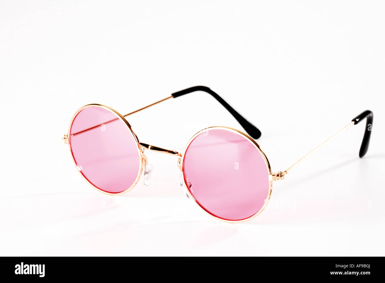 Pink metal-rimmed spectacles Stock Photo - Alamy