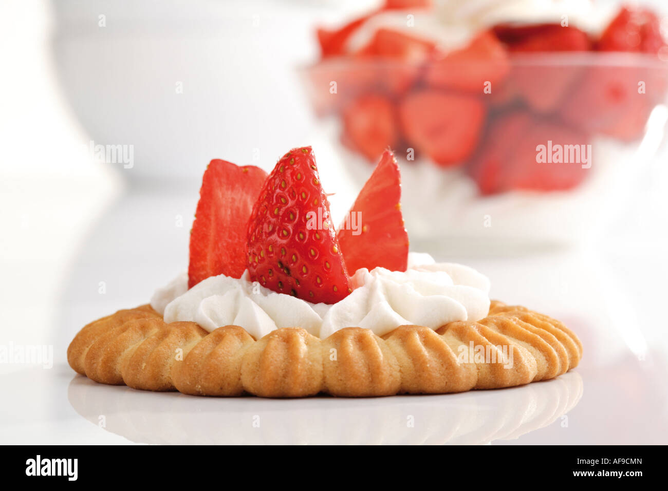Strawberry tartelet with whipped cream Stock Photo - Alamy