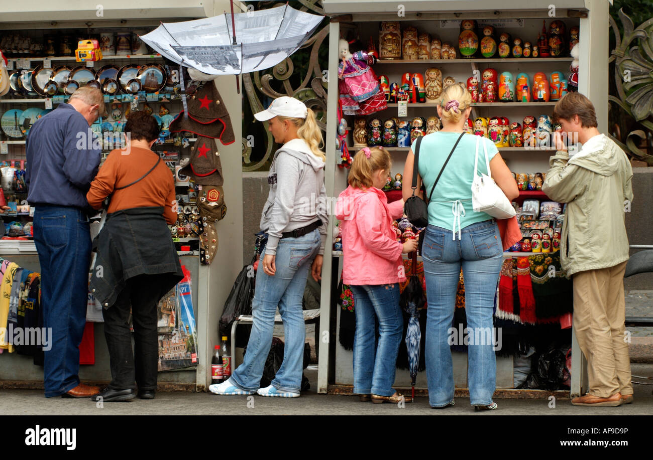 Souvenir shopping St Petersburg Russia Tourists purchase souvenirs and ...