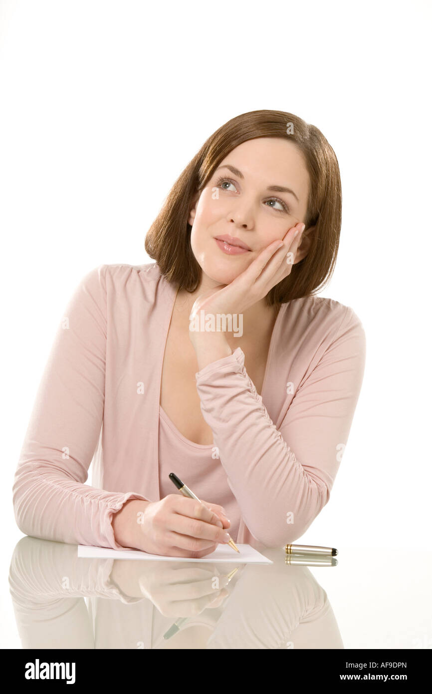 Young woman writing letter, portrait Stock Photo - Alamy