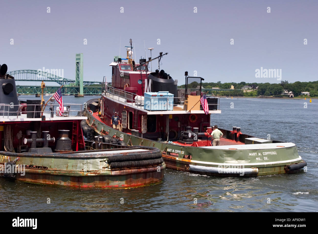 Tugboats tied to the dock Stock Photo - Alamy