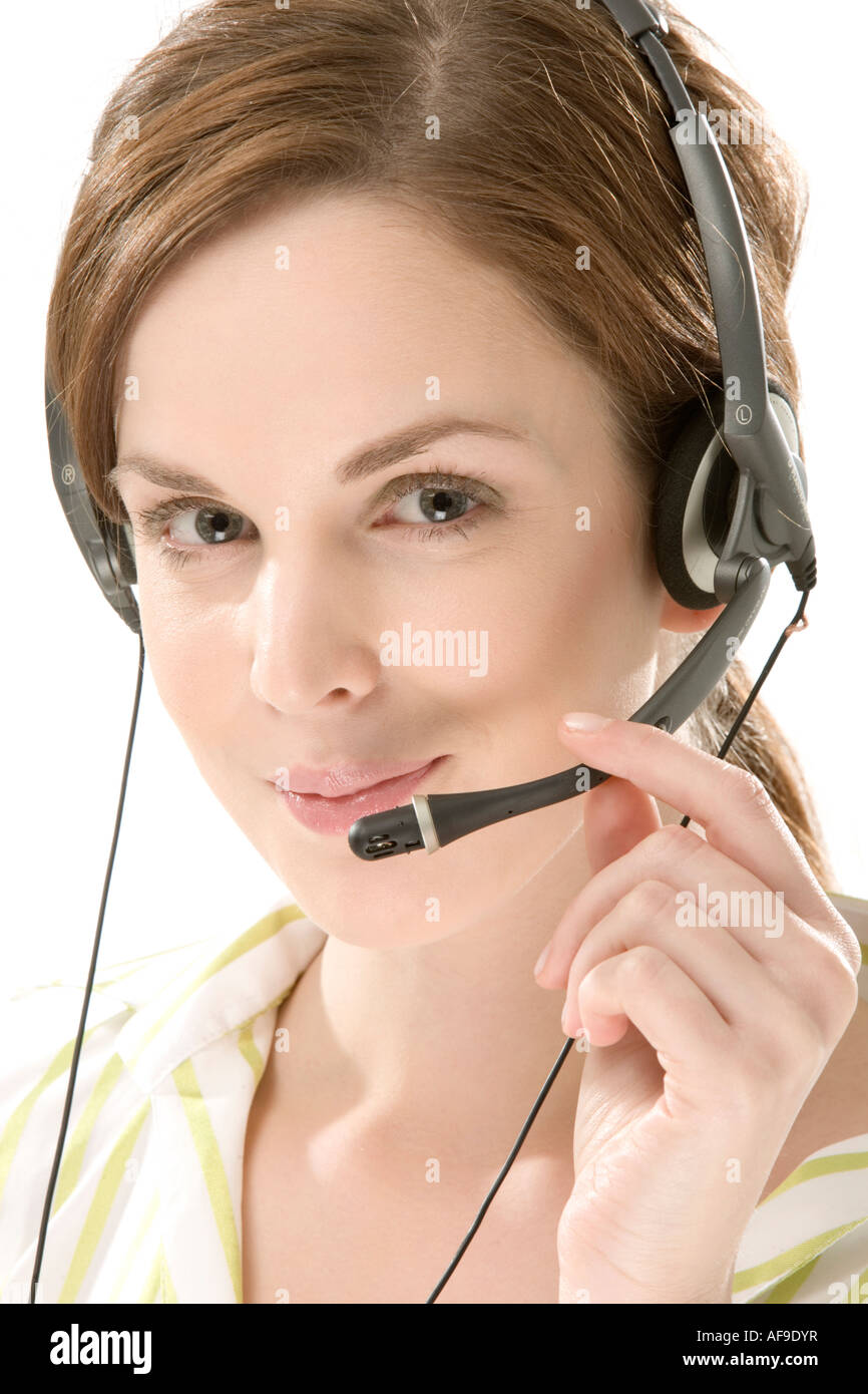 Young woman wearing headset, portrait Stock Photo - Alamy