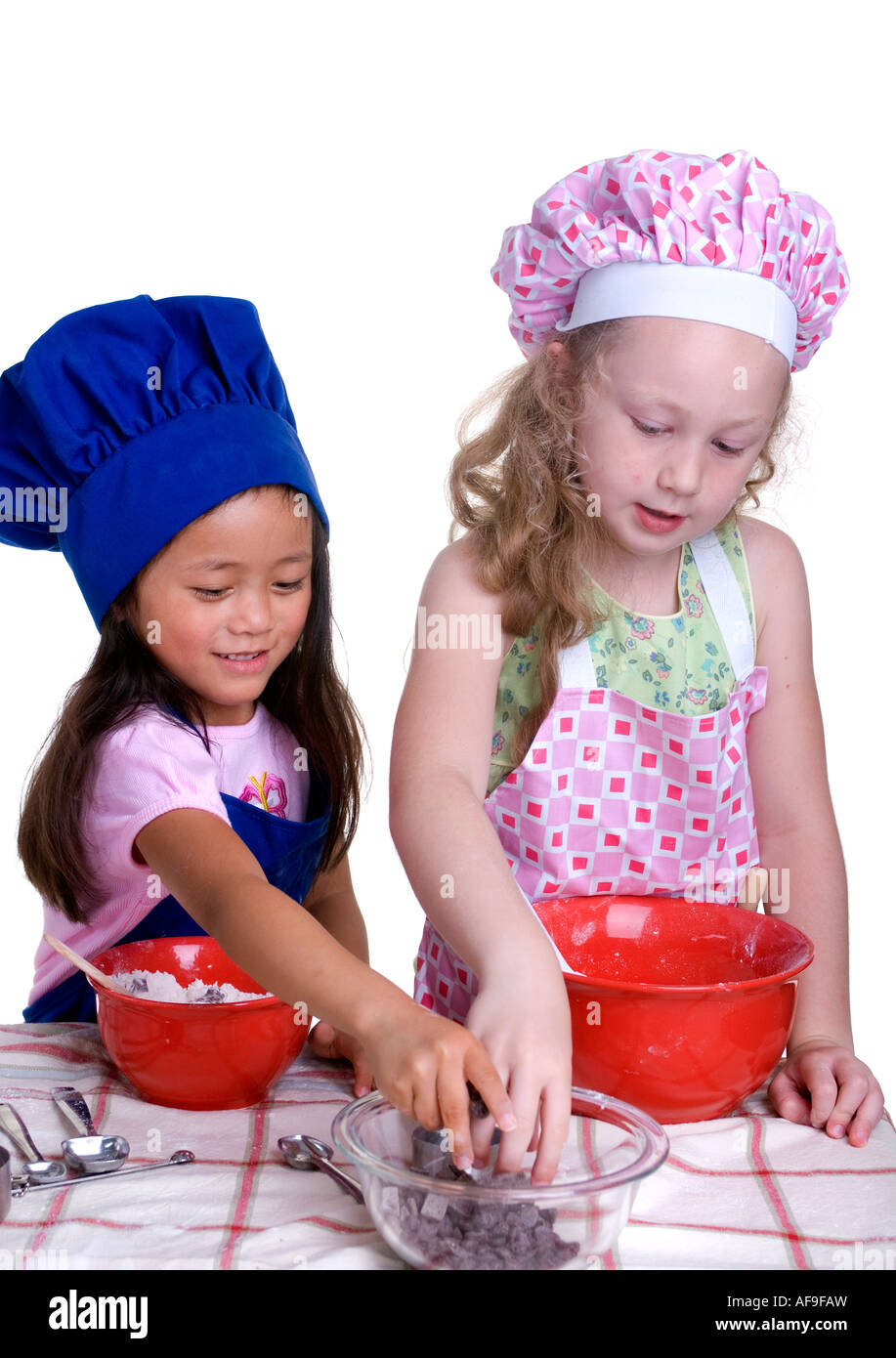 Children cooking measuring asian hi-res stock photography and images - Alamy