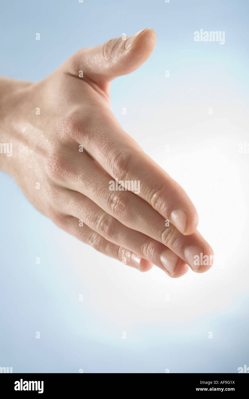 Hand gesture indicating handshake, close-up Stock Photo - Alamy