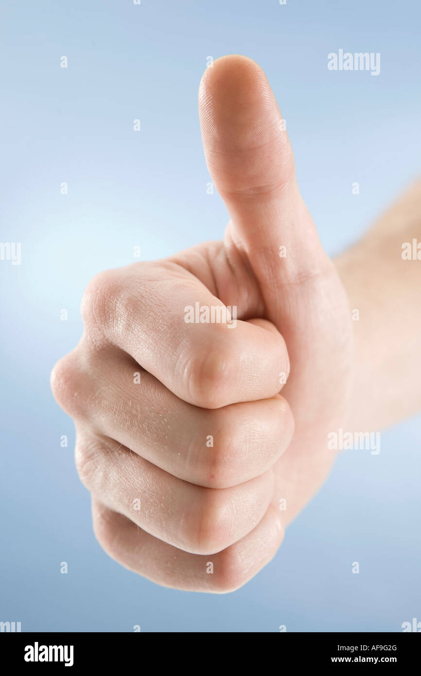Hand gesture, thumbs up, close-up Stock Photo - Alamy