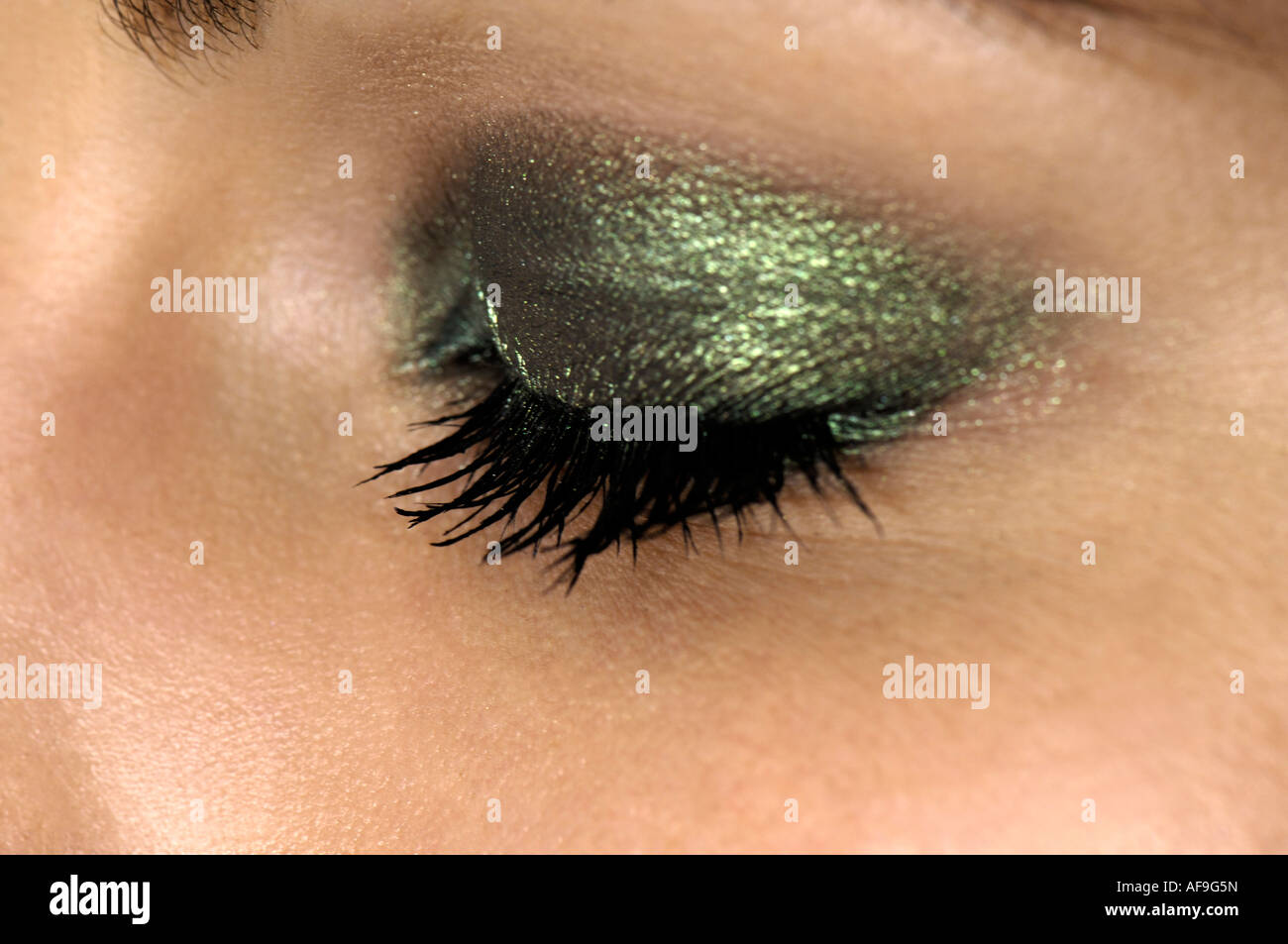 Dark green glitter eyeshadow hi-res stock photography and images - Alamy