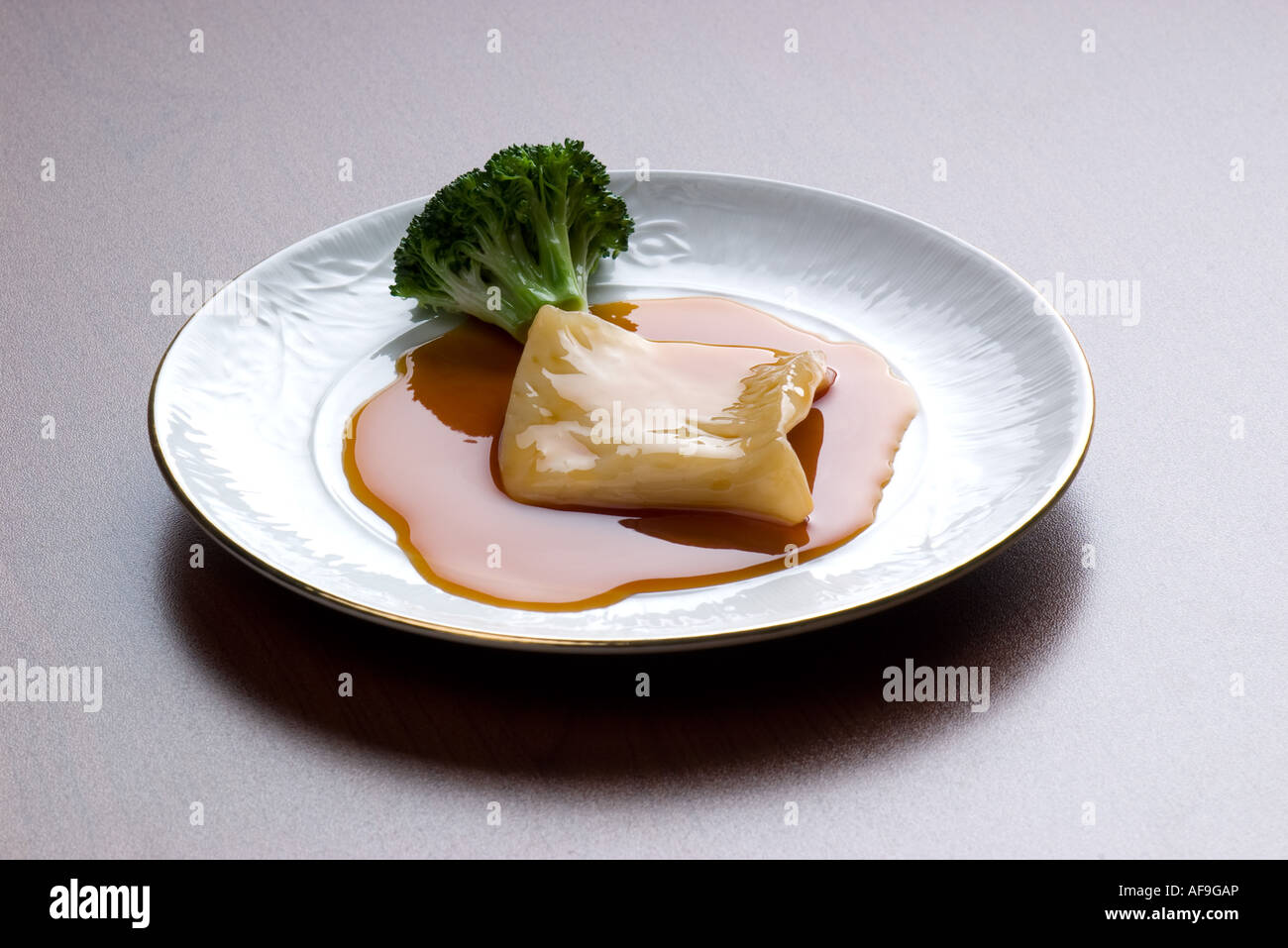 Chinese Food Braised Fish Maw with Abalone Sauce Stock Photo - Alamy