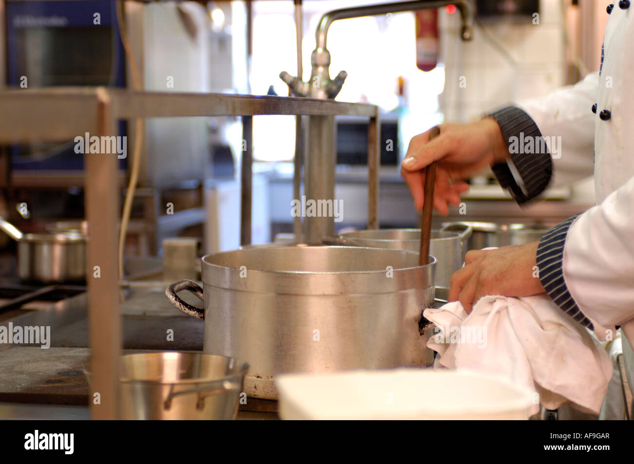 Restaurant kitchen, cook Stock Photo - Alamy