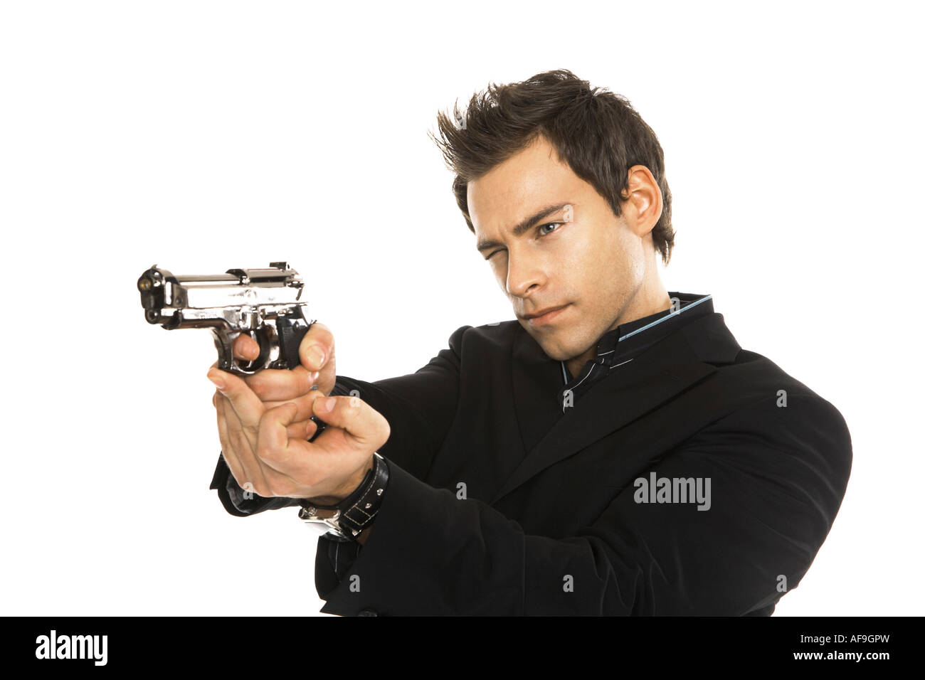 Young man holding hand gun, close-up Stock Photo - Alamy Young man holding hand gun, close-up Stock Photo - Alamy