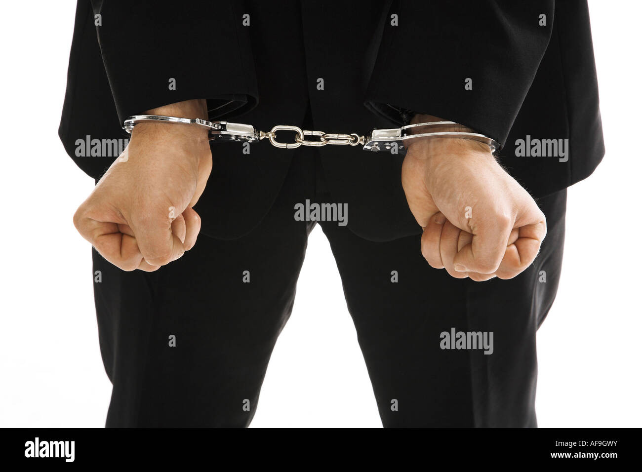Man wearing handcuffs, close-up Stock Photo - Alamy