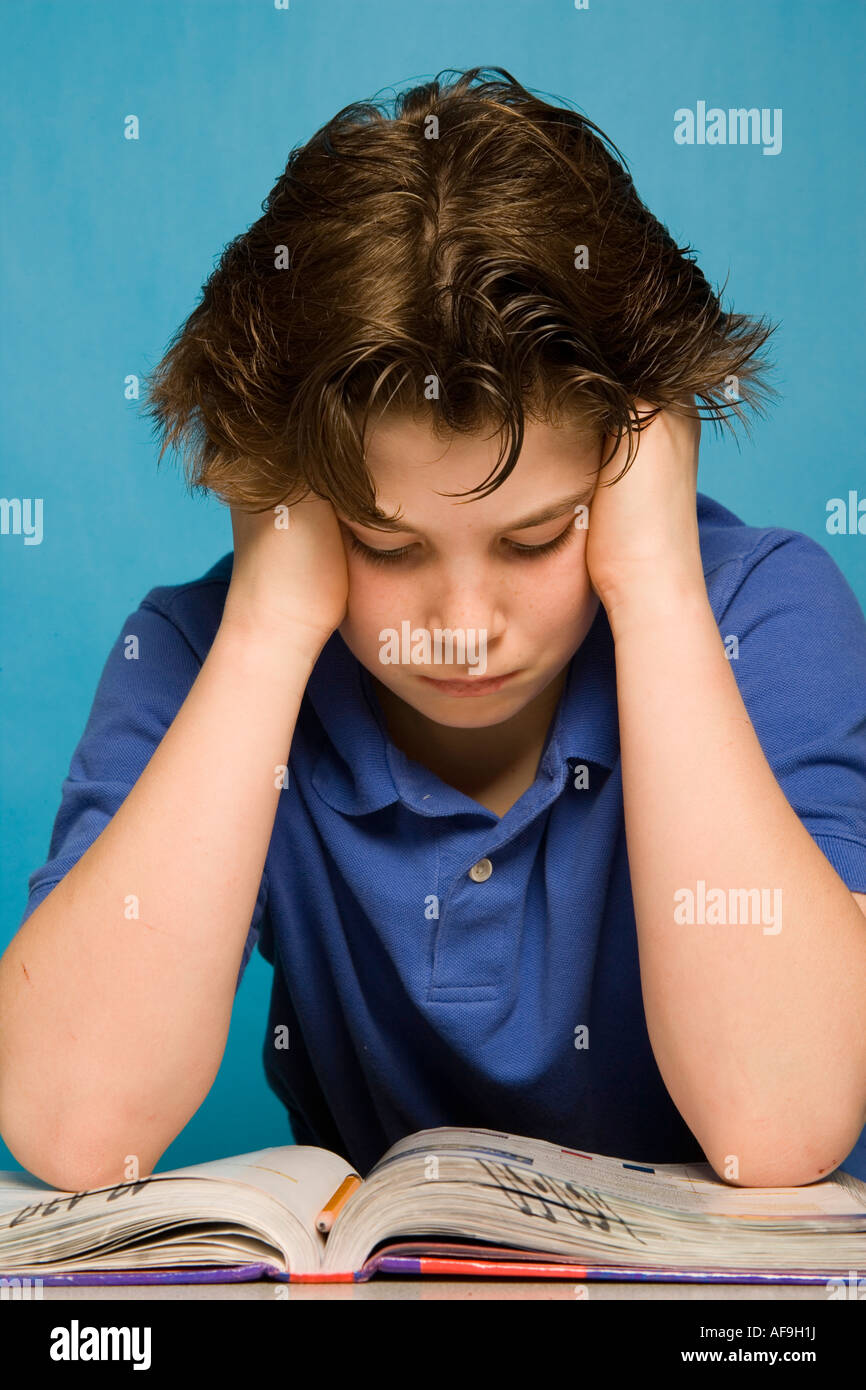 Young child reading Stock Photo - Alamy