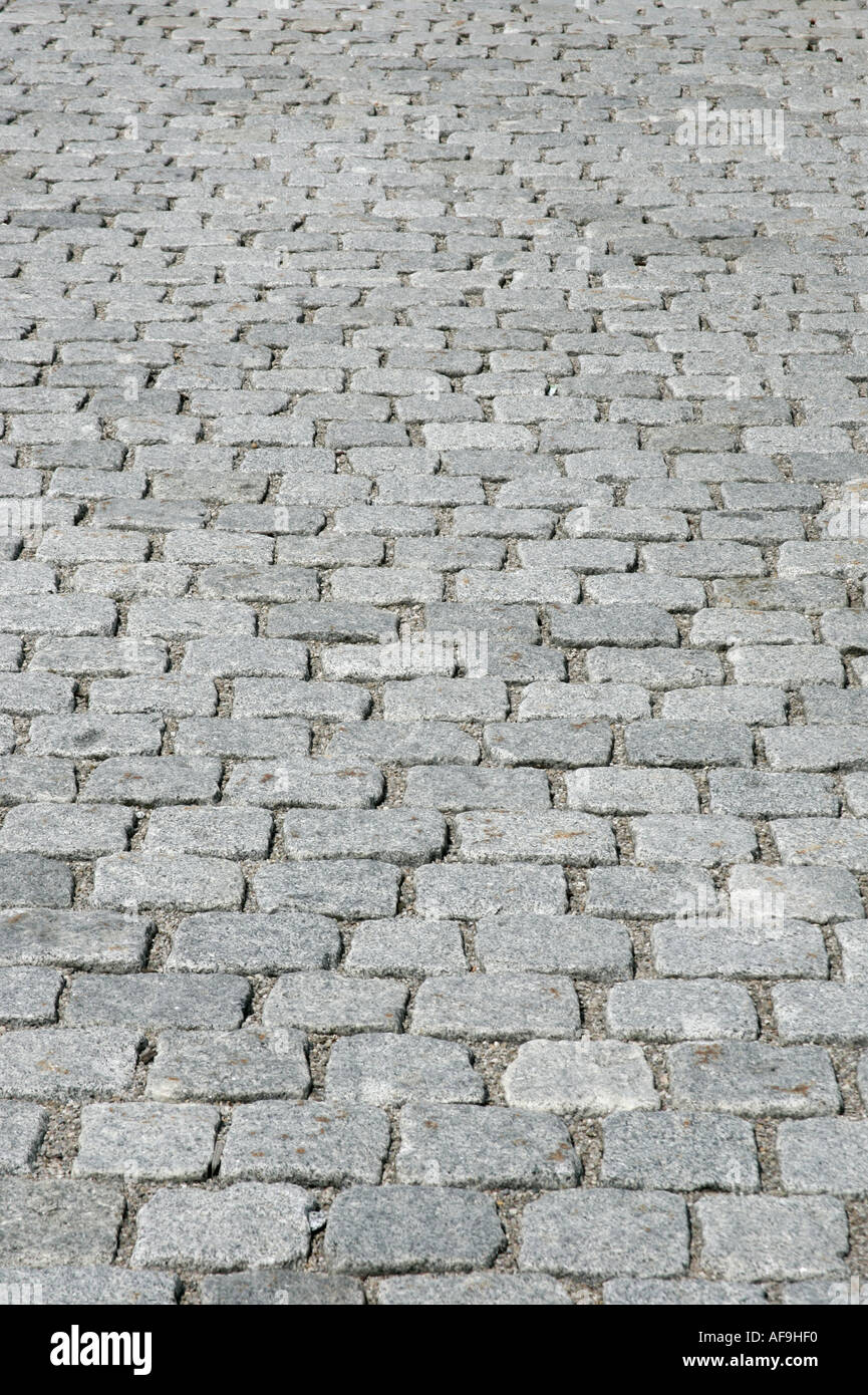 Looking down at cobblestone footpath Stock Photo - Alamy