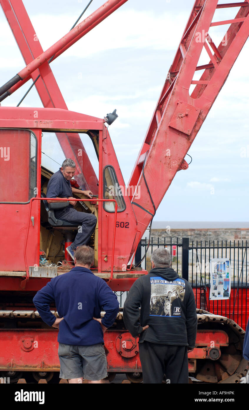Man driving mobile crane, Watchet harbour, Somerset, England, UK Stock ...