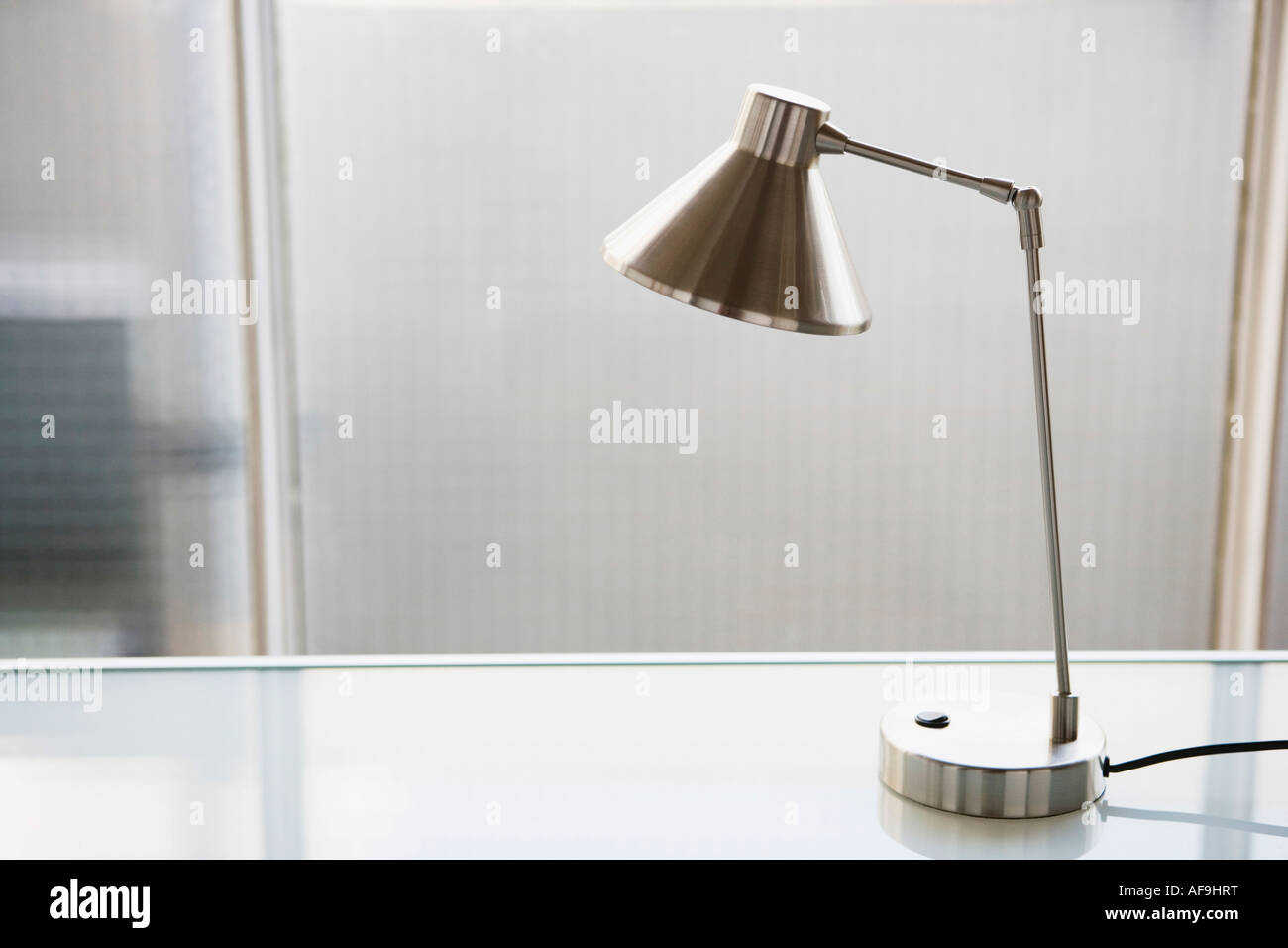 Lamp on desk, close-up Stock Photo - Alamy