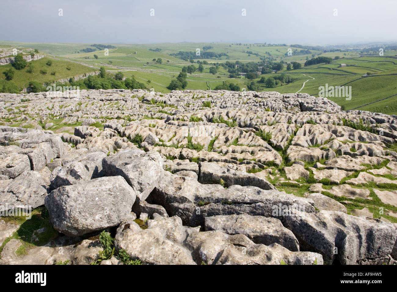 Deeply eroded worn limestone pavement at Malham Cove, Yorkshire Dales ...