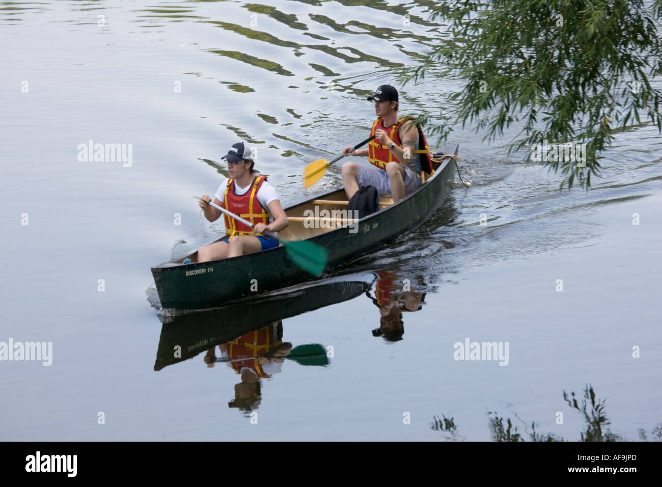 Two men paddling canadian canoe hi-res stock photography and images - Alamy