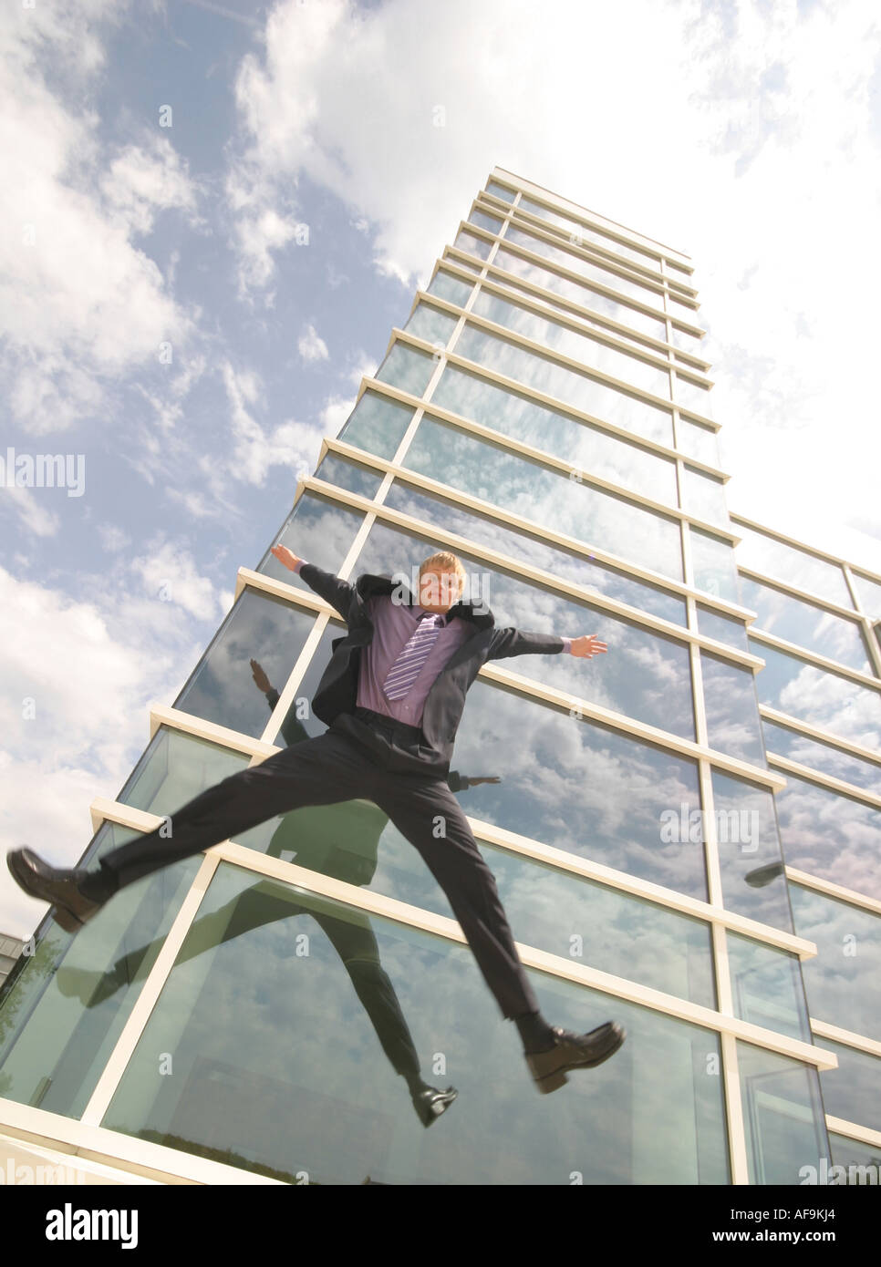 Young man falling from building hi-res stock photography and images - Alamy