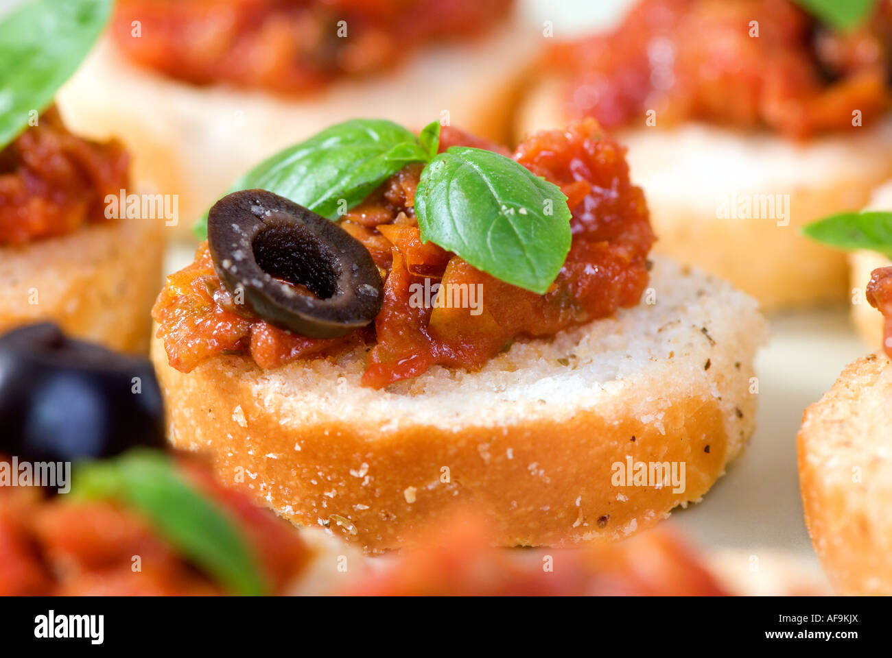 The perfect Italian appetizer fresh bruschetta with basil and olives ...