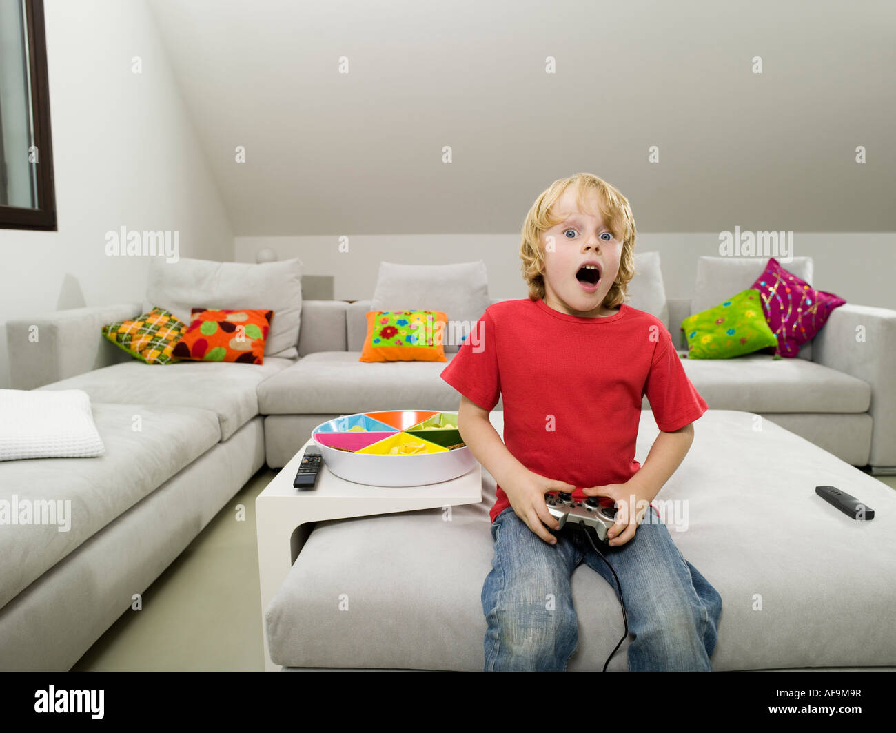 Boy playing computer game Stock Photo - Alamy