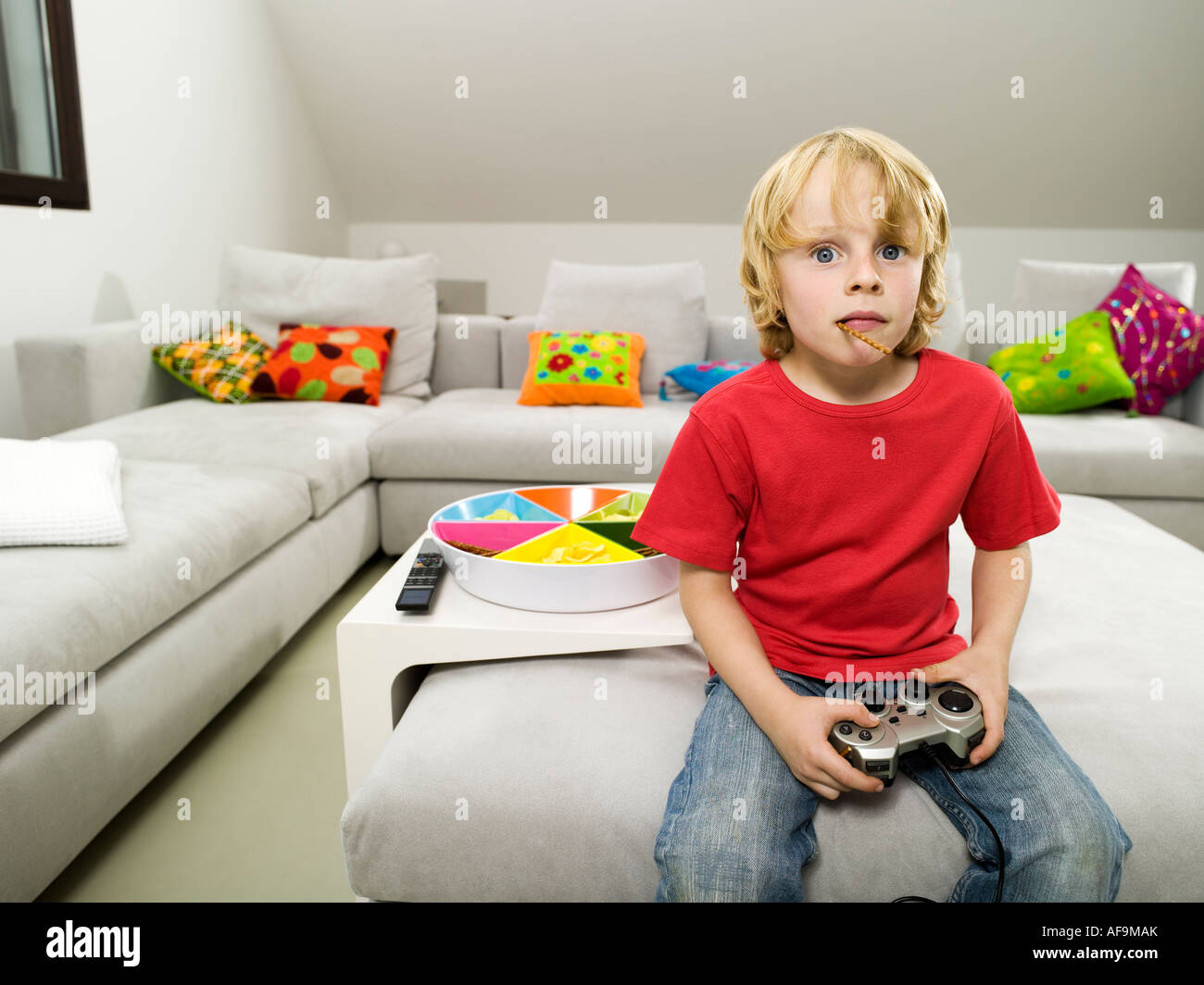 Boy playing computer game Stock Photo - Alamy