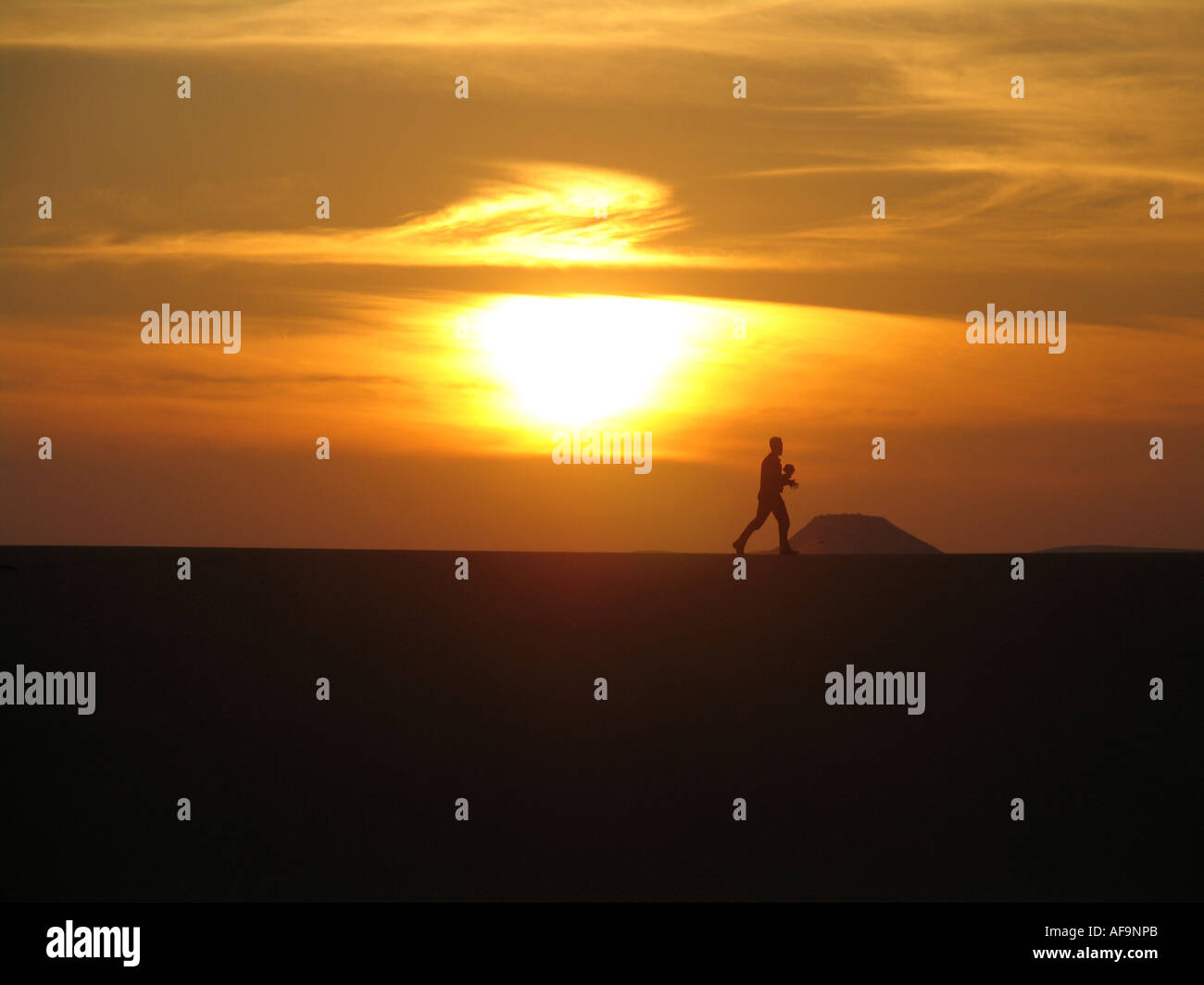 Runner silhouette in front hi-res stock photography and images - Alamy