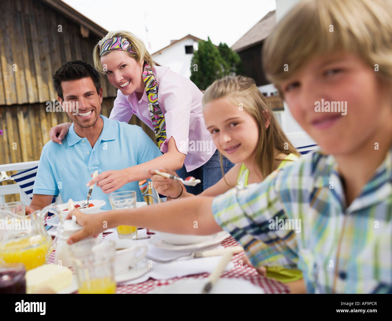 Family at breakfast table Stock Photo - Alamy