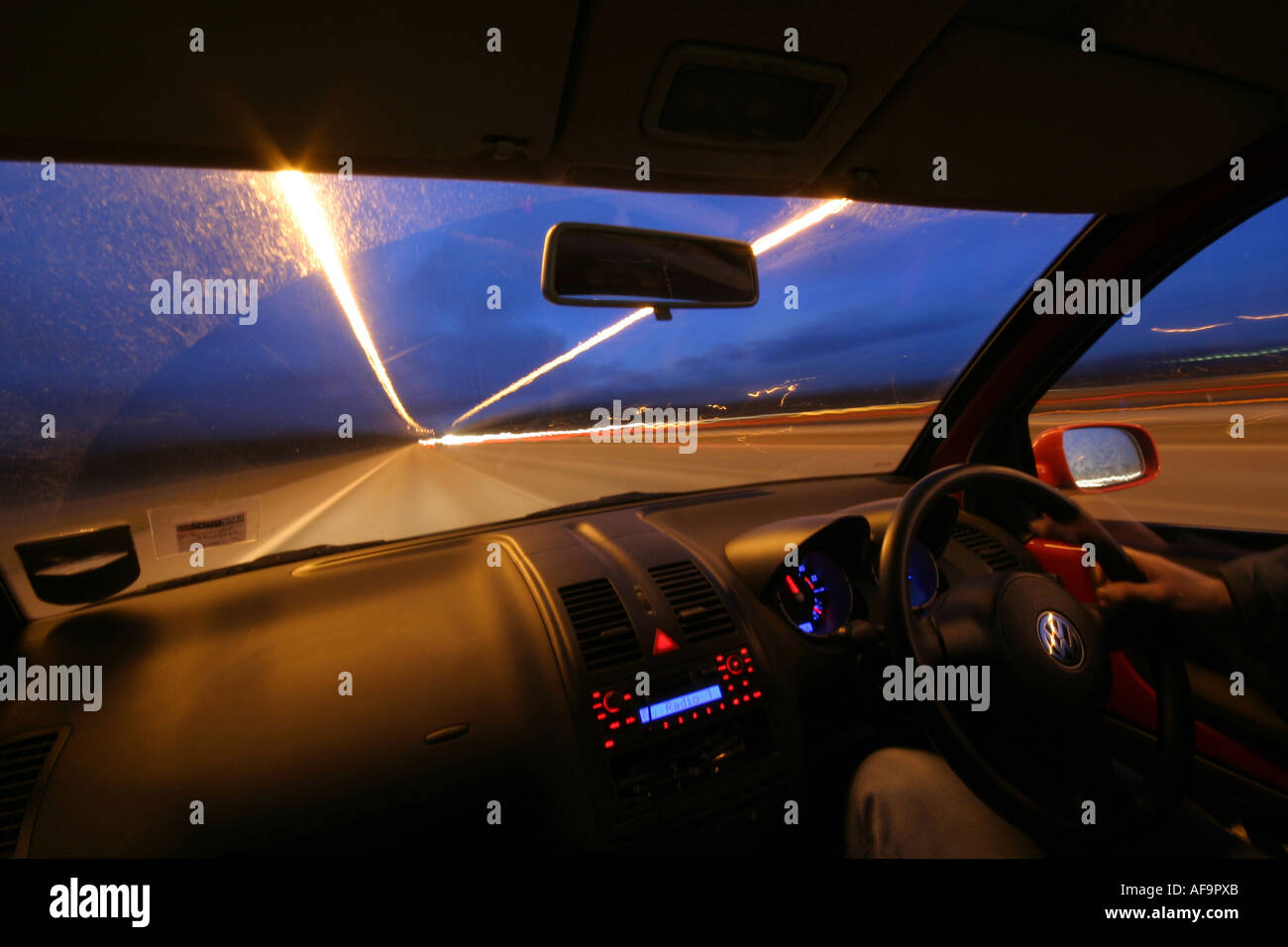 A Stock Photograph of the Inside of a car driving in the night Stock ...